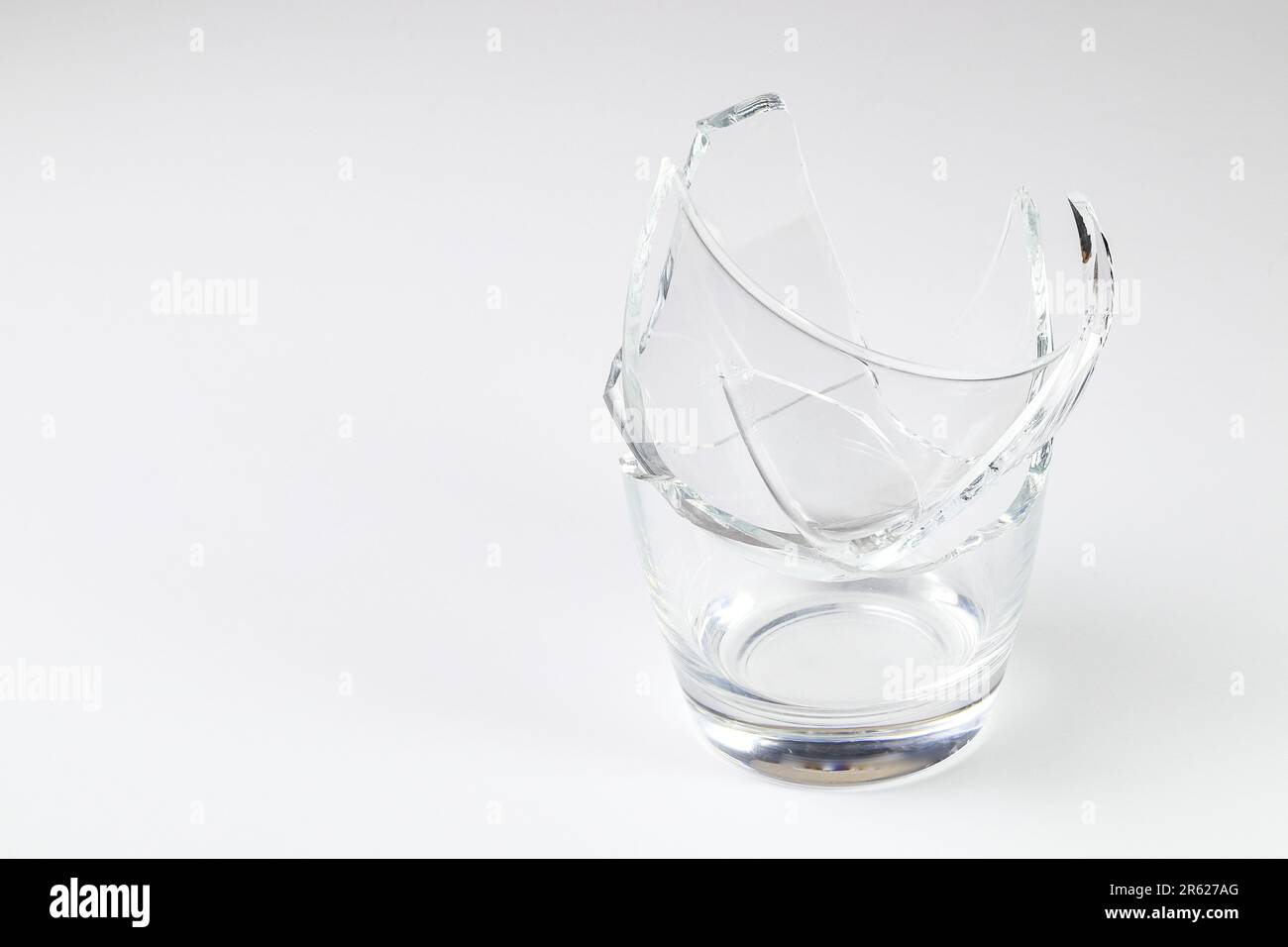 sharp Pieces of broken glass isolated on white background Stock Photo ...