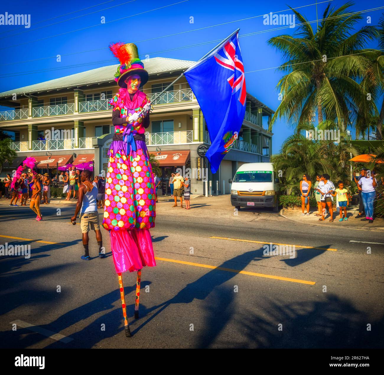 Grand Cayman, Cayman Islands, May 2023, view of a man on stilts ...