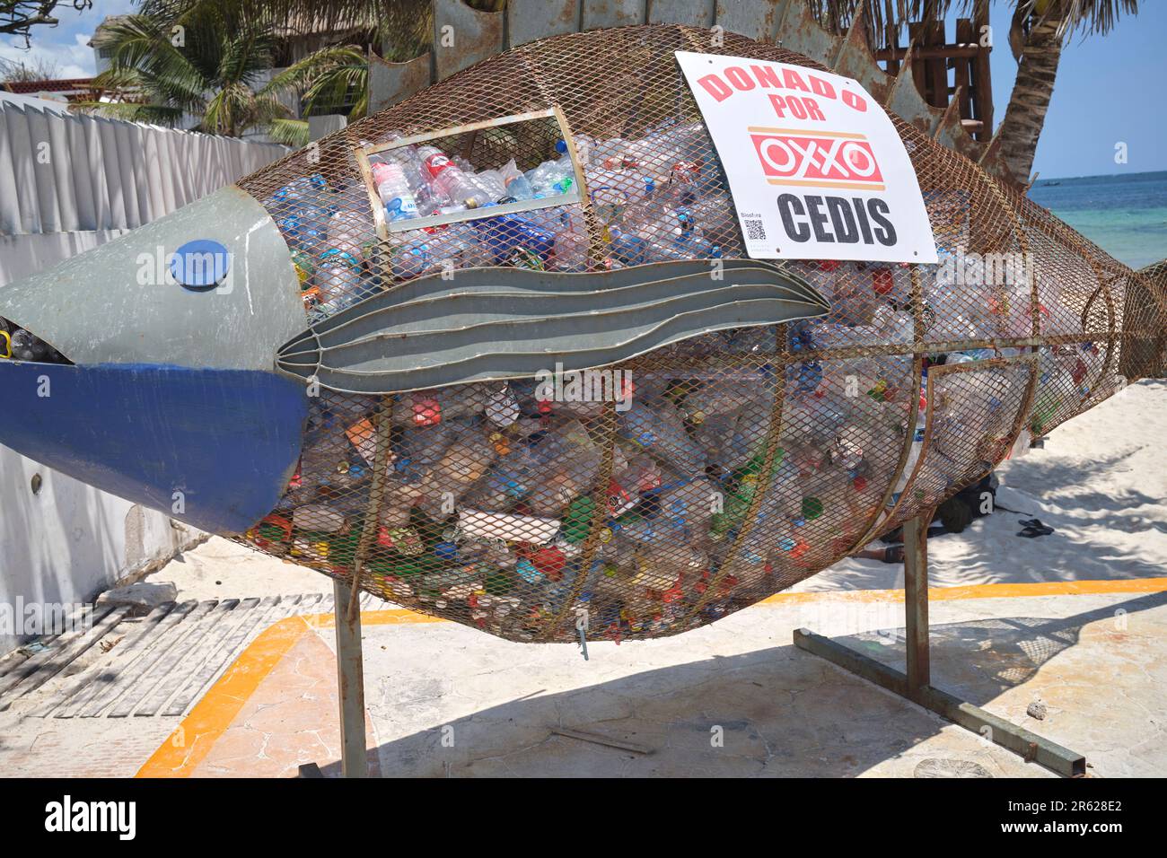Fish Shaped Bottle Recycling Basket on the beach at Puerto Morelos ...