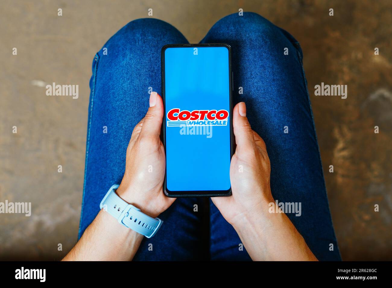 In this photo illustration, the Costco Wholesale logo is displayed on a ...