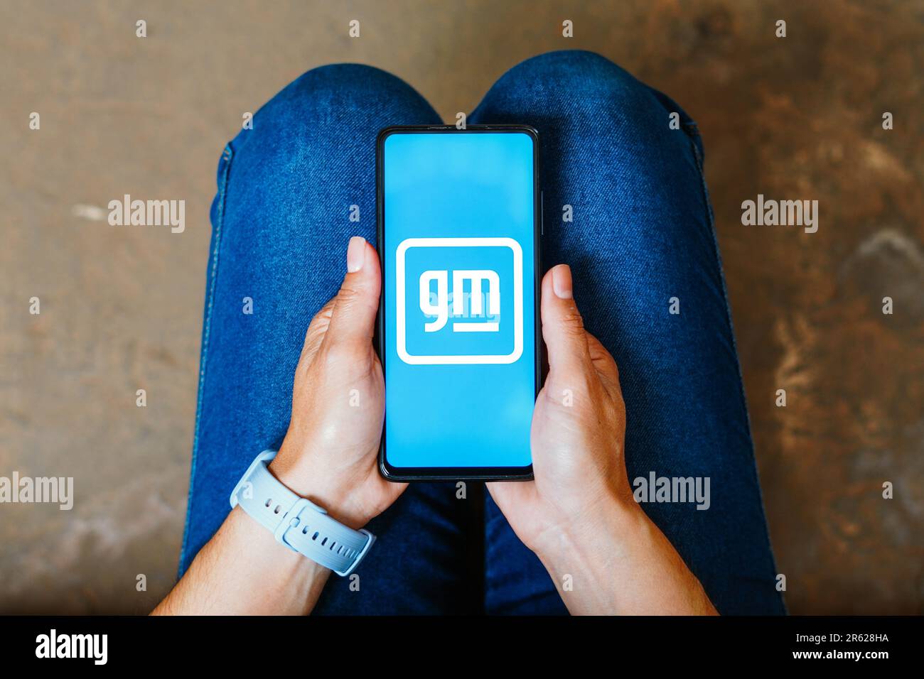 In this photo illustration, the General Motors Company (GM) logo is ...