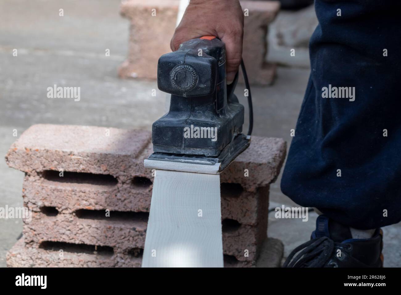 Sander in action, sander in work Stock Photo - Alamy