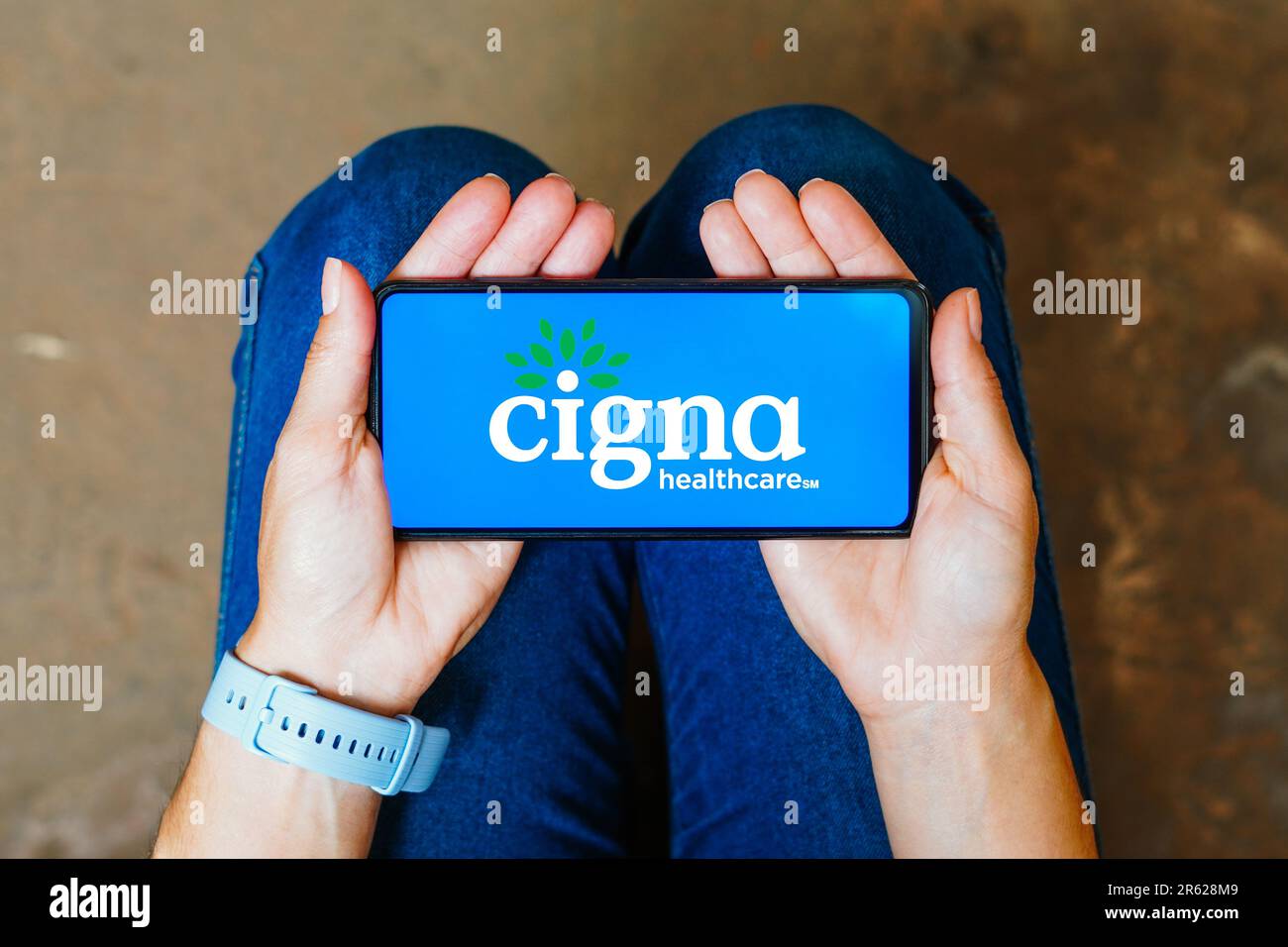 In this photo illustration, the Cigna Healthcare logo is displayed on a ...