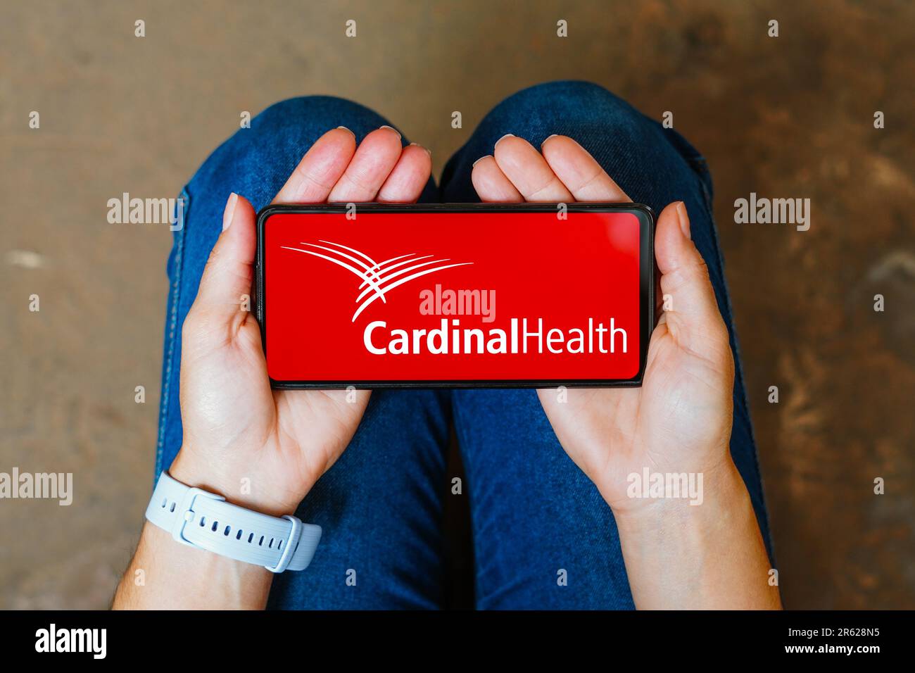 In this photo illustration, the Cardinal Health logo is displayed on a ...