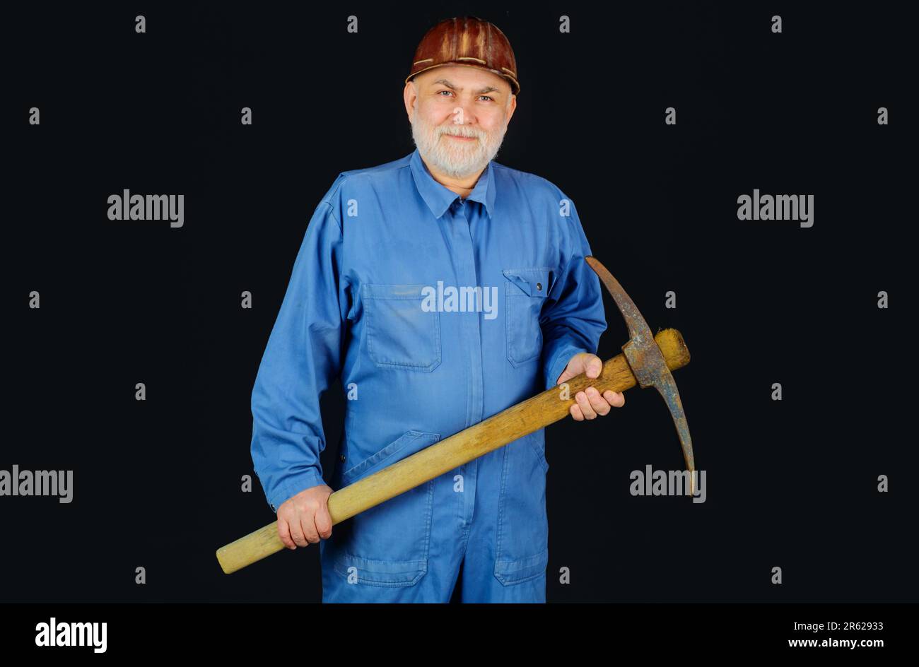 Miner man with pickaxe. Construction worker with pickaxe. Male laborer ...