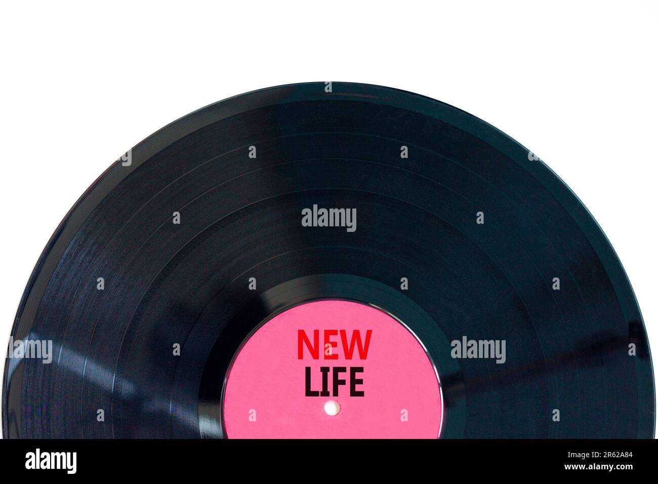 New life symbol. Concept words New life on beautiful black vinyl disk ...