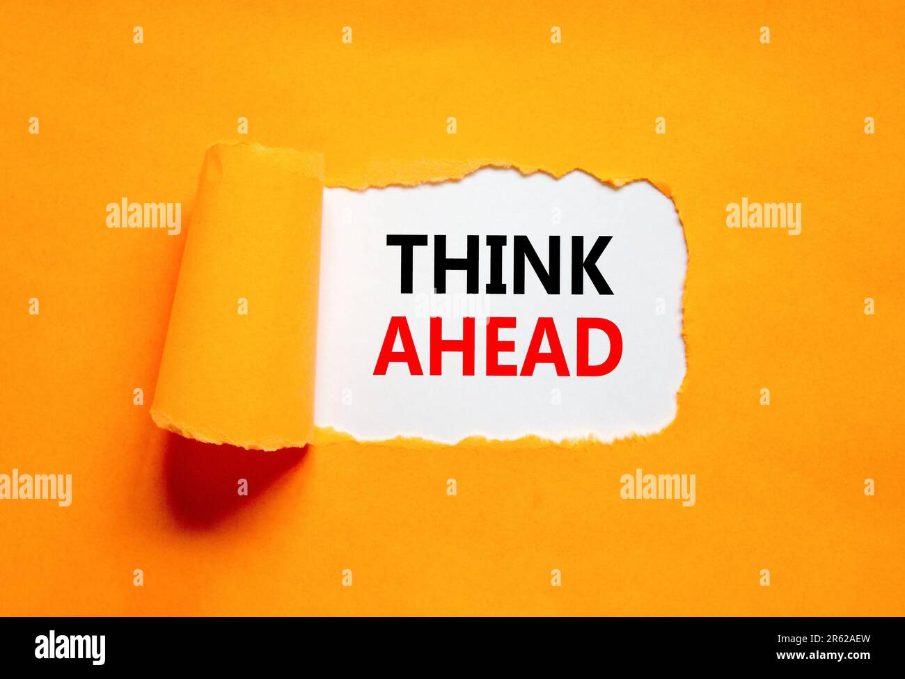 Think ahead symbol. Concept words Think ahead on beautiful white paper ...