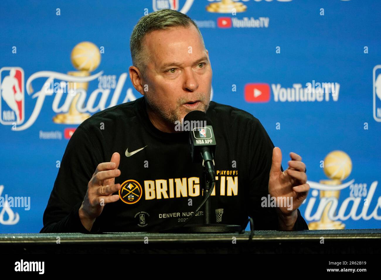 Denver Nuggets head coach Michael Moore speaks before NBA basketball ...