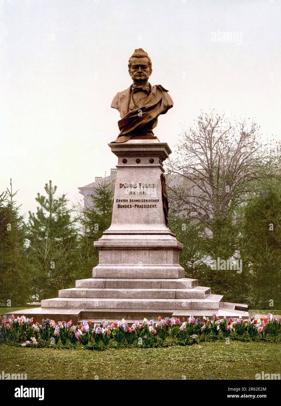 Dr. Jonas Furrer Monument Statue surrounded by flowers and trees at ...