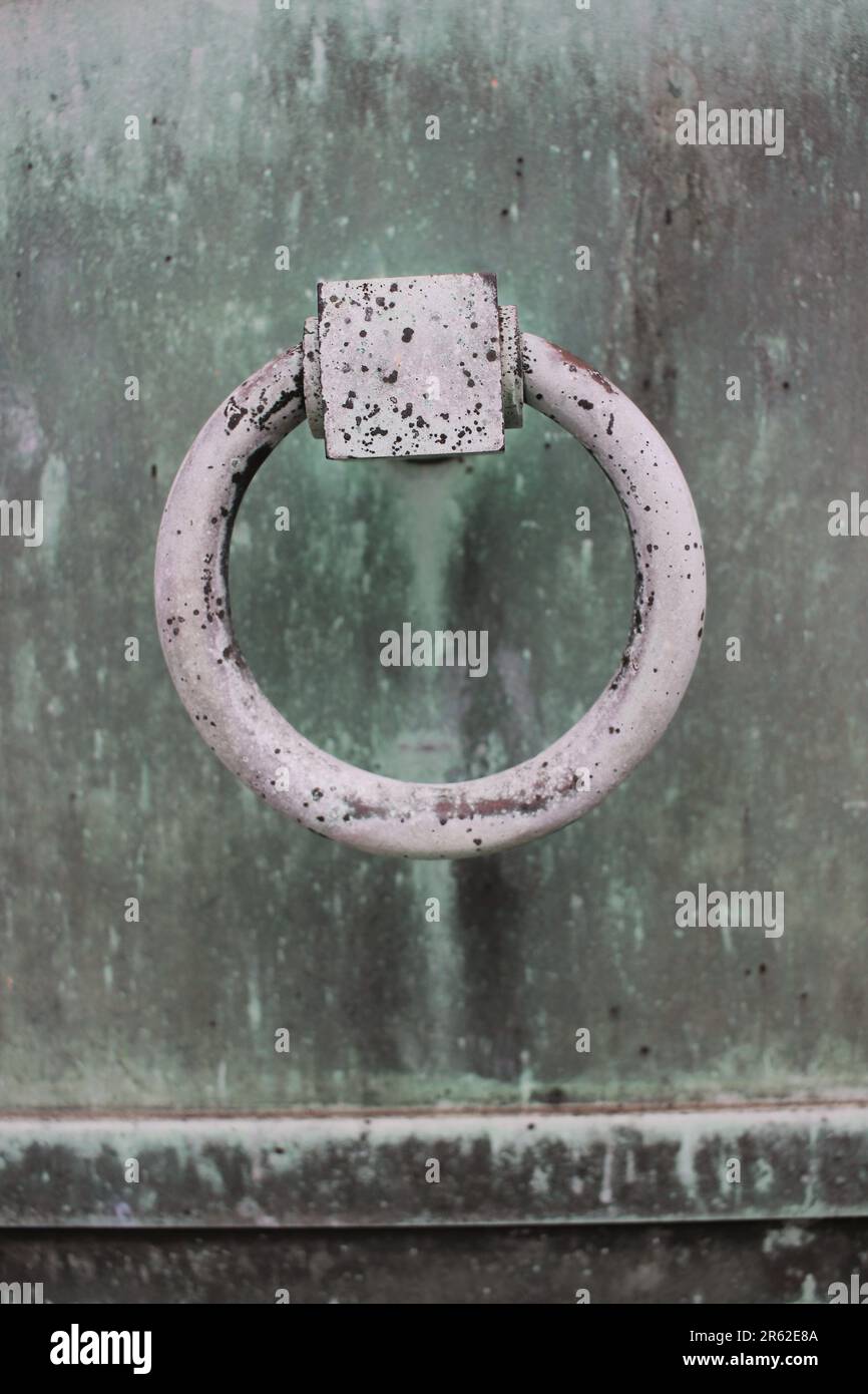 A round door handle protecting a traditional medieval gate Stock Photo ...