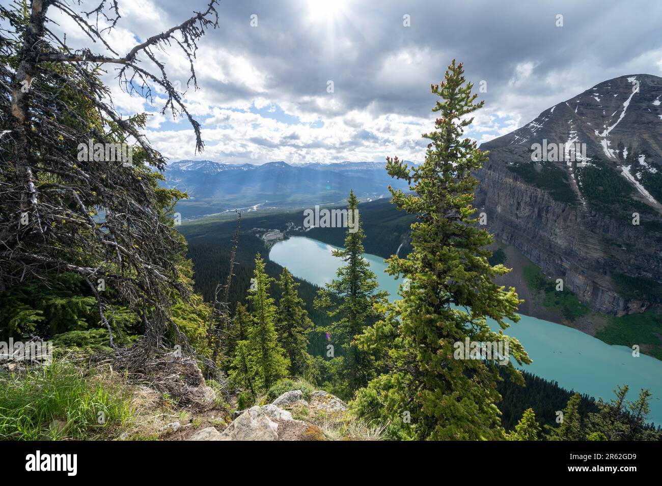 View of Lake Louise from the top of Big Beehive hike, with sunbeams ...