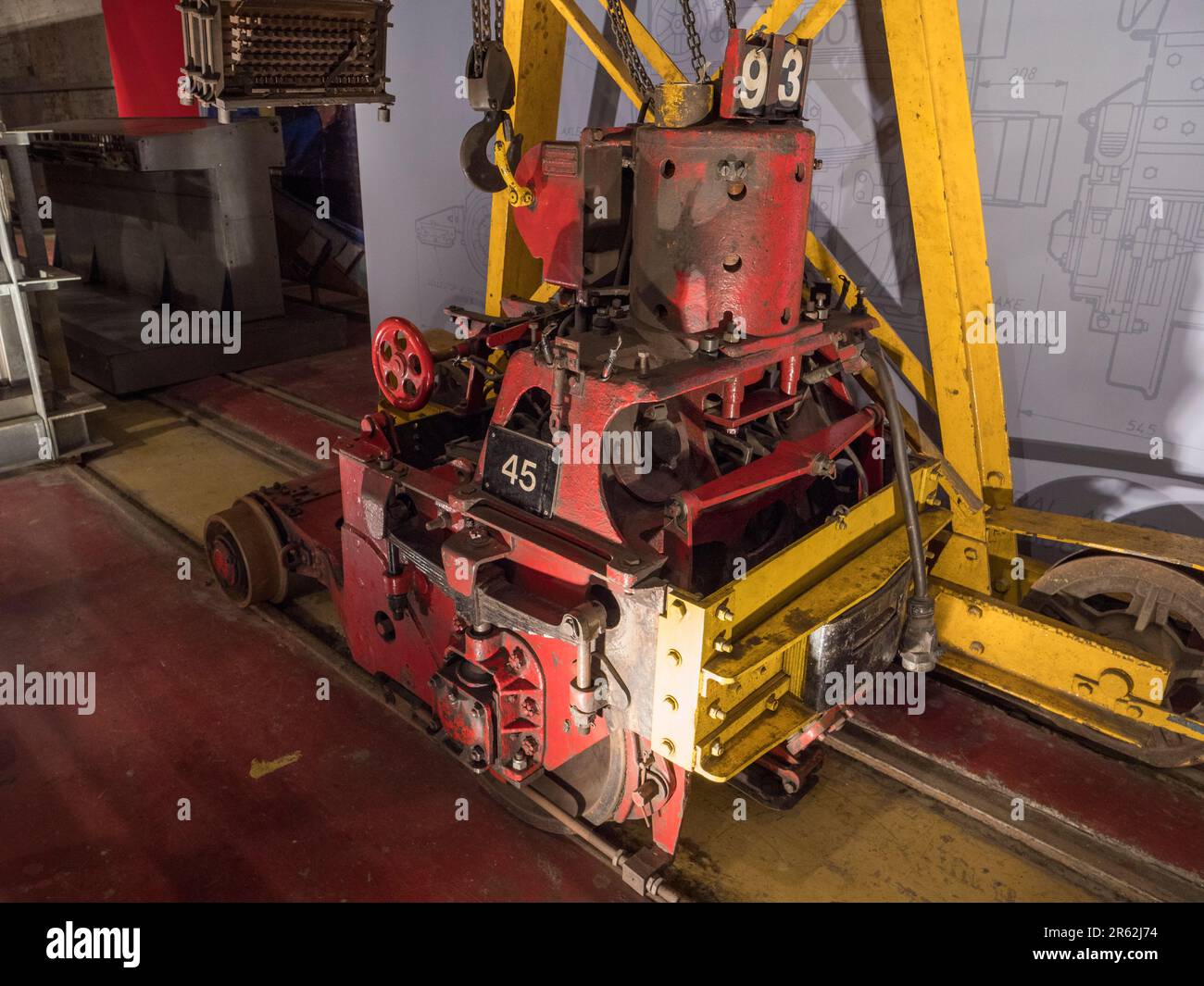 A deconstructed engine (1930s) and crane on display in the Mail Rail ...