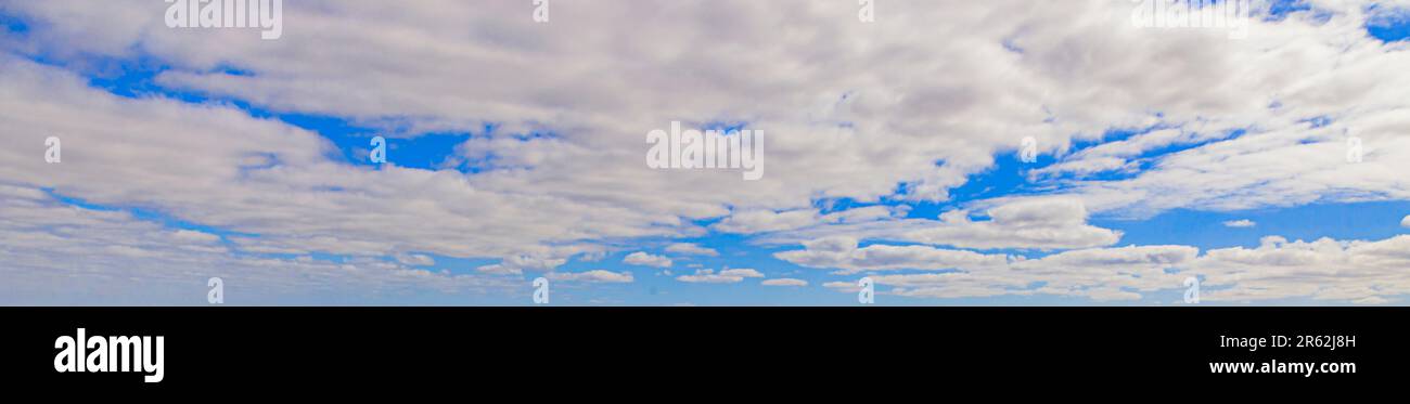 Image of a partly cloudy and partly clear sky during the day without ...