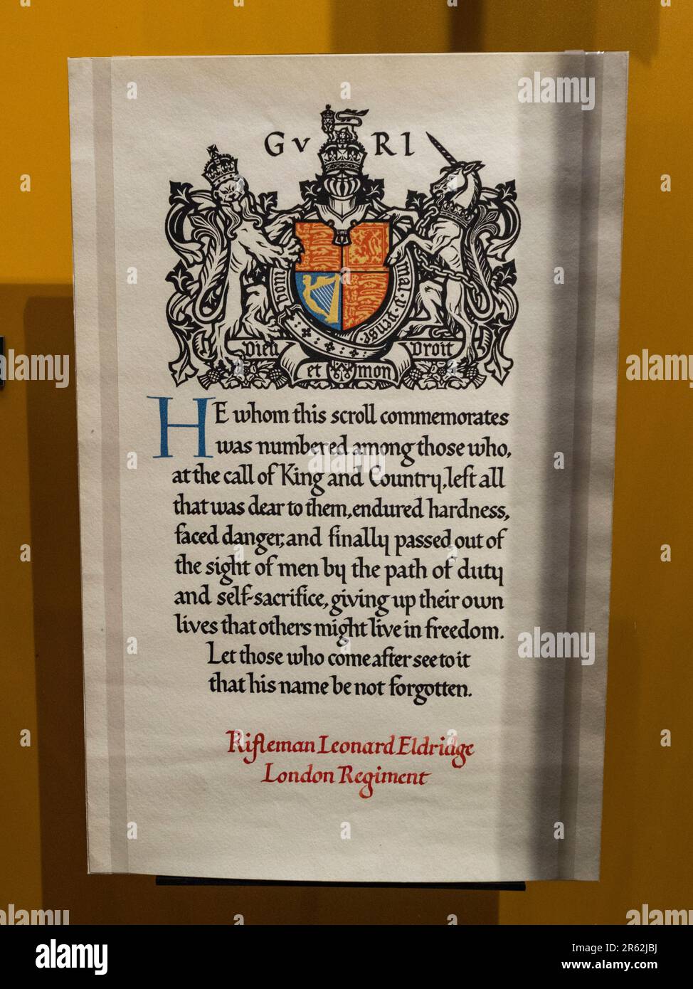 A memorial plaque and scroll sent to the next of kin of men and women ...