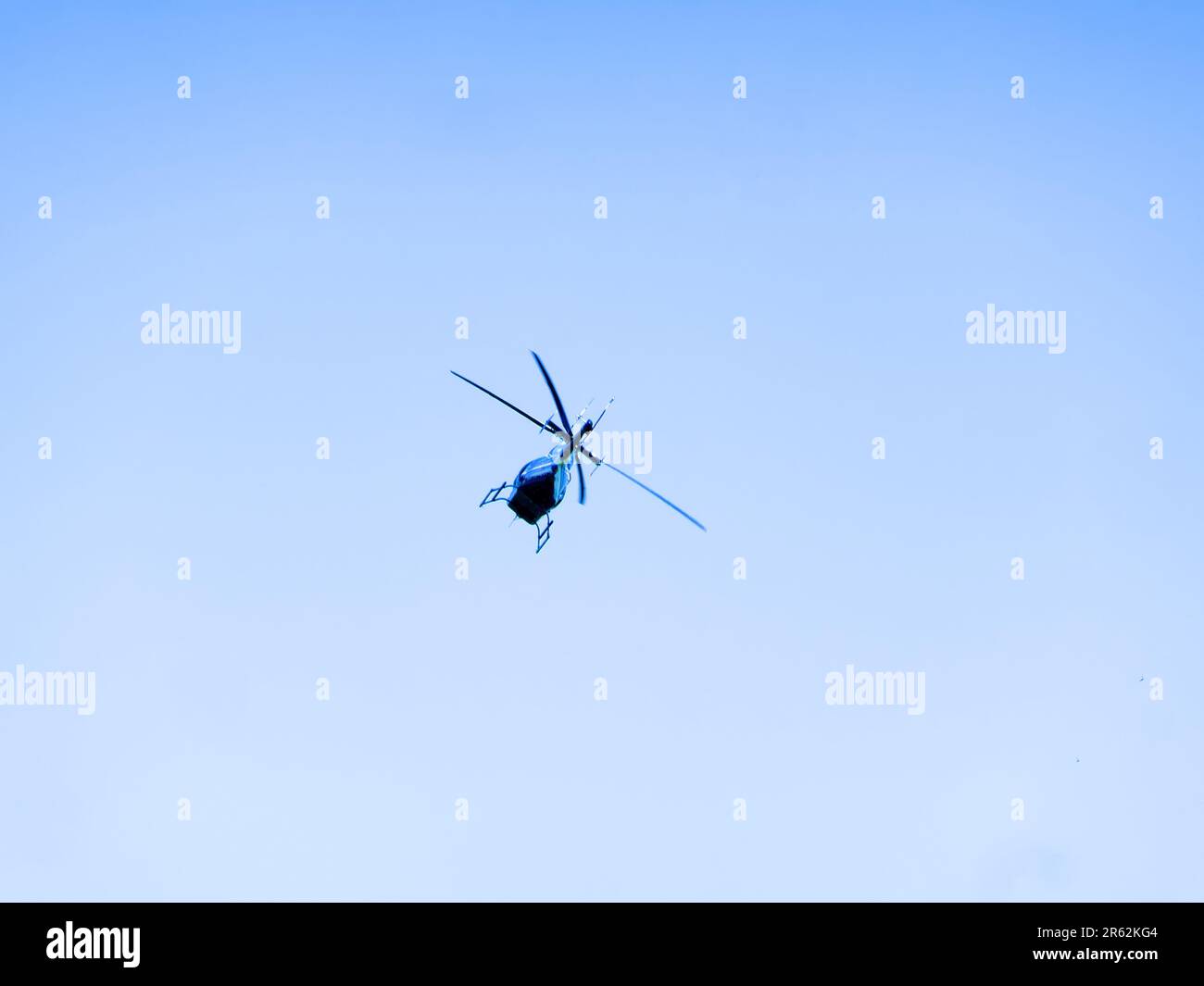 A light helicopter. Aerial evolutions Stock Photo - Alamy