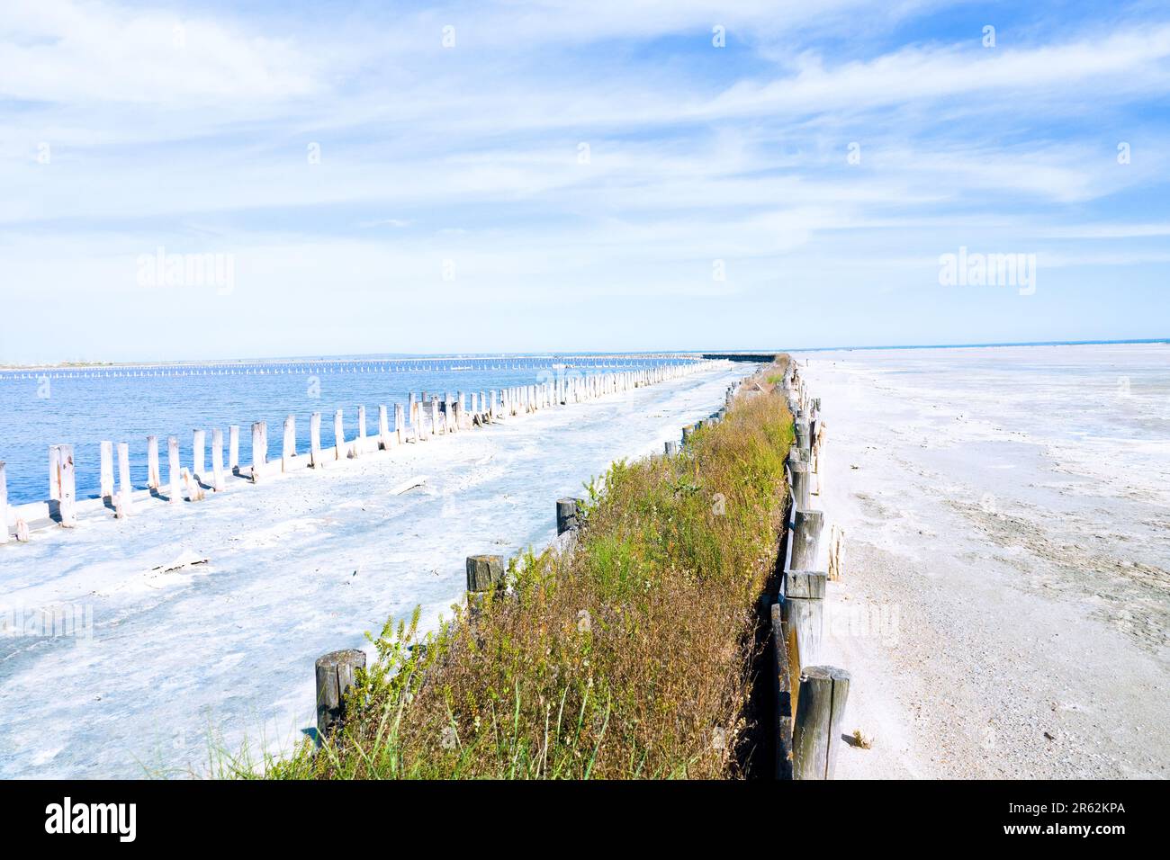 An ancient abandoned salt factory, saltworks. The remains of wooden ...