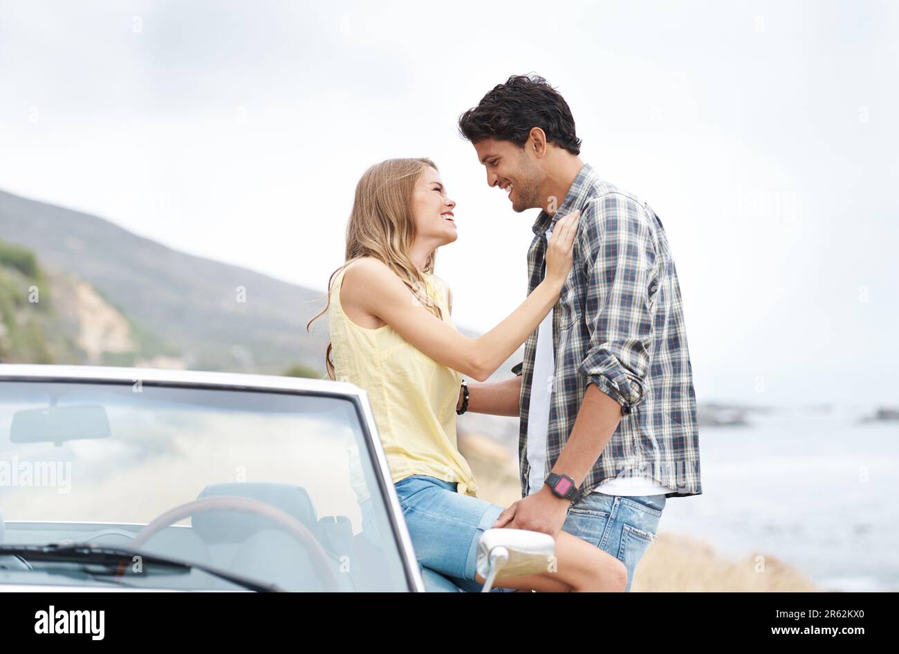 Sharing an affectionate moment. A young couple sharing a romantic ...
