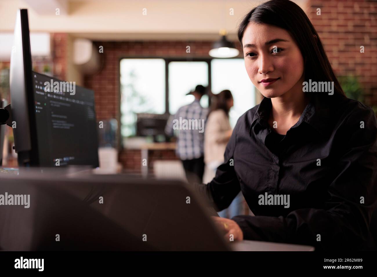 Asian Freelance Coder Analyzing Compiling Html Code On Computer Display Working On Interface