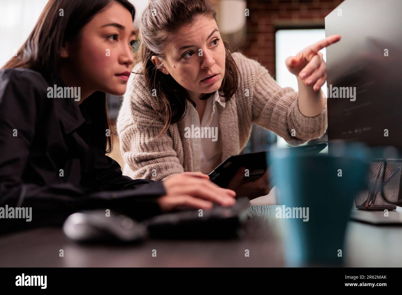 System Engineers Collaborating On Coding Project Discussing About Programming Algorithm For New