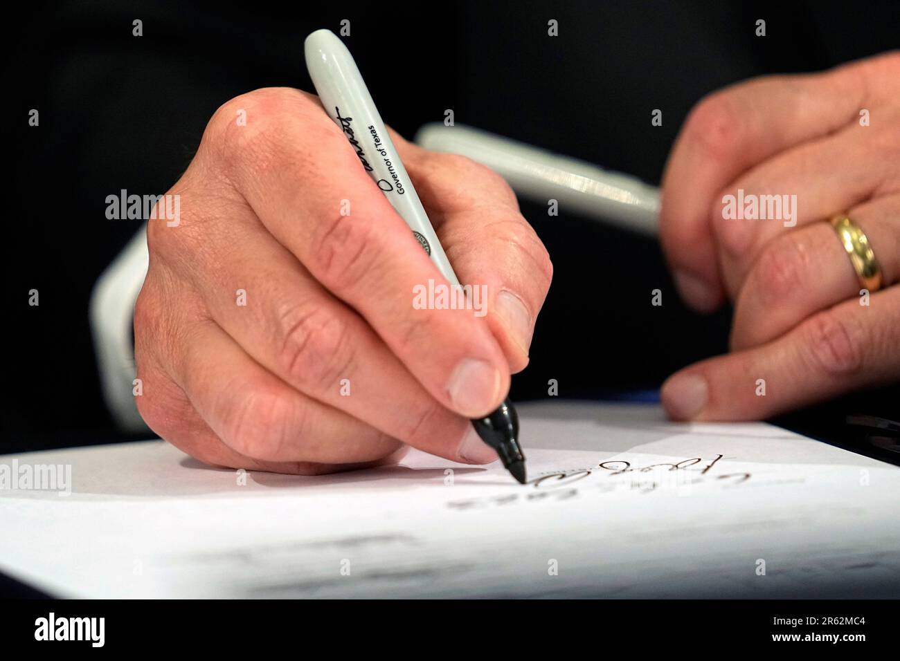 Texas Gov. Greg Abbott signs one of several Public Safety bills at the ...