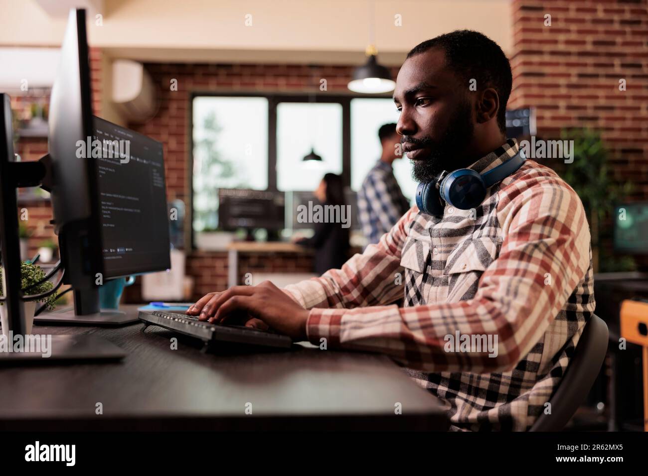 Freelance Coder Typing Javascript Code On Computer To Develop Online Cloud Computing Information