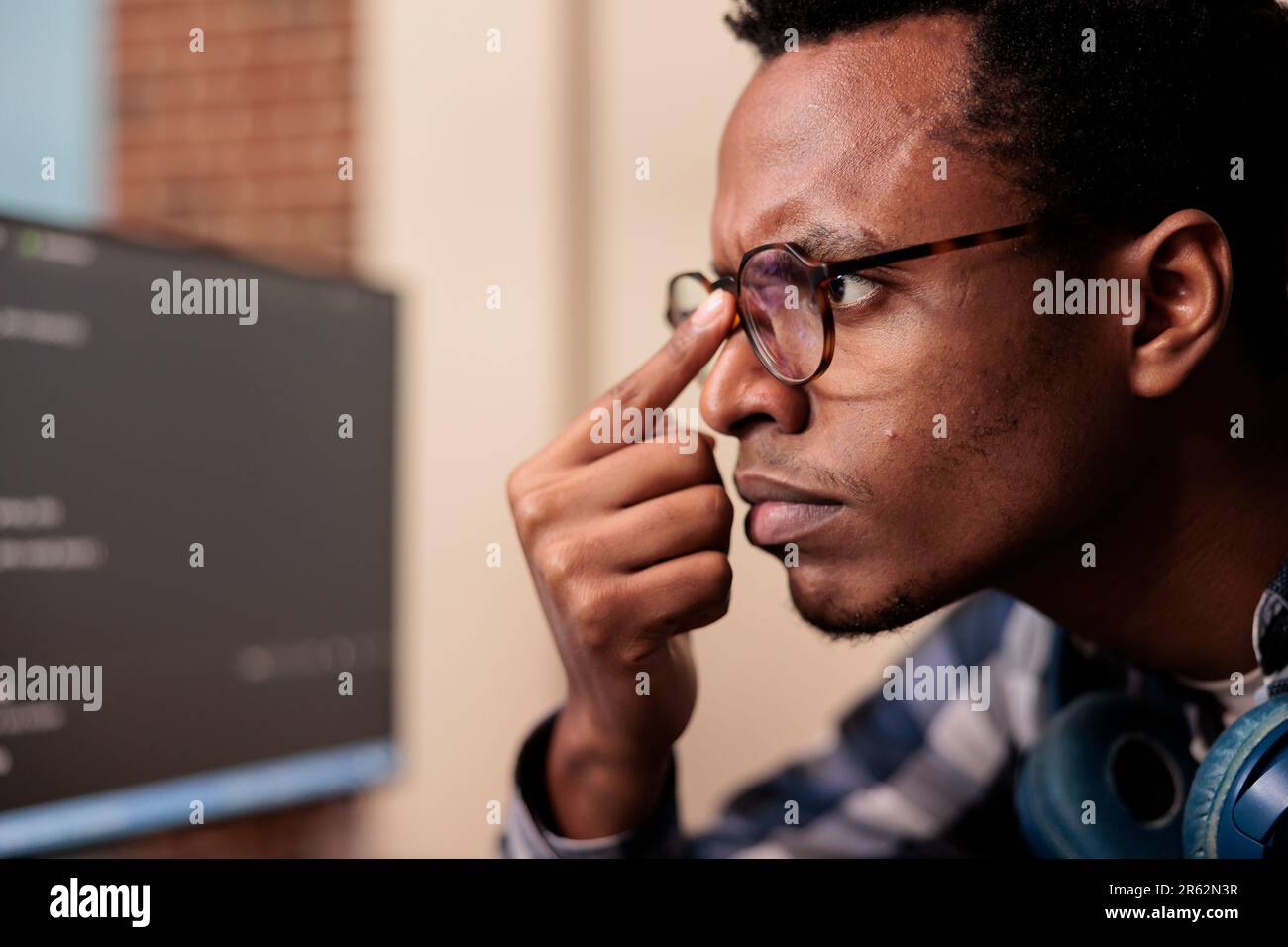 Software Developer Typing Machine Learning Server Code On Computer Sitting At Desk In Software