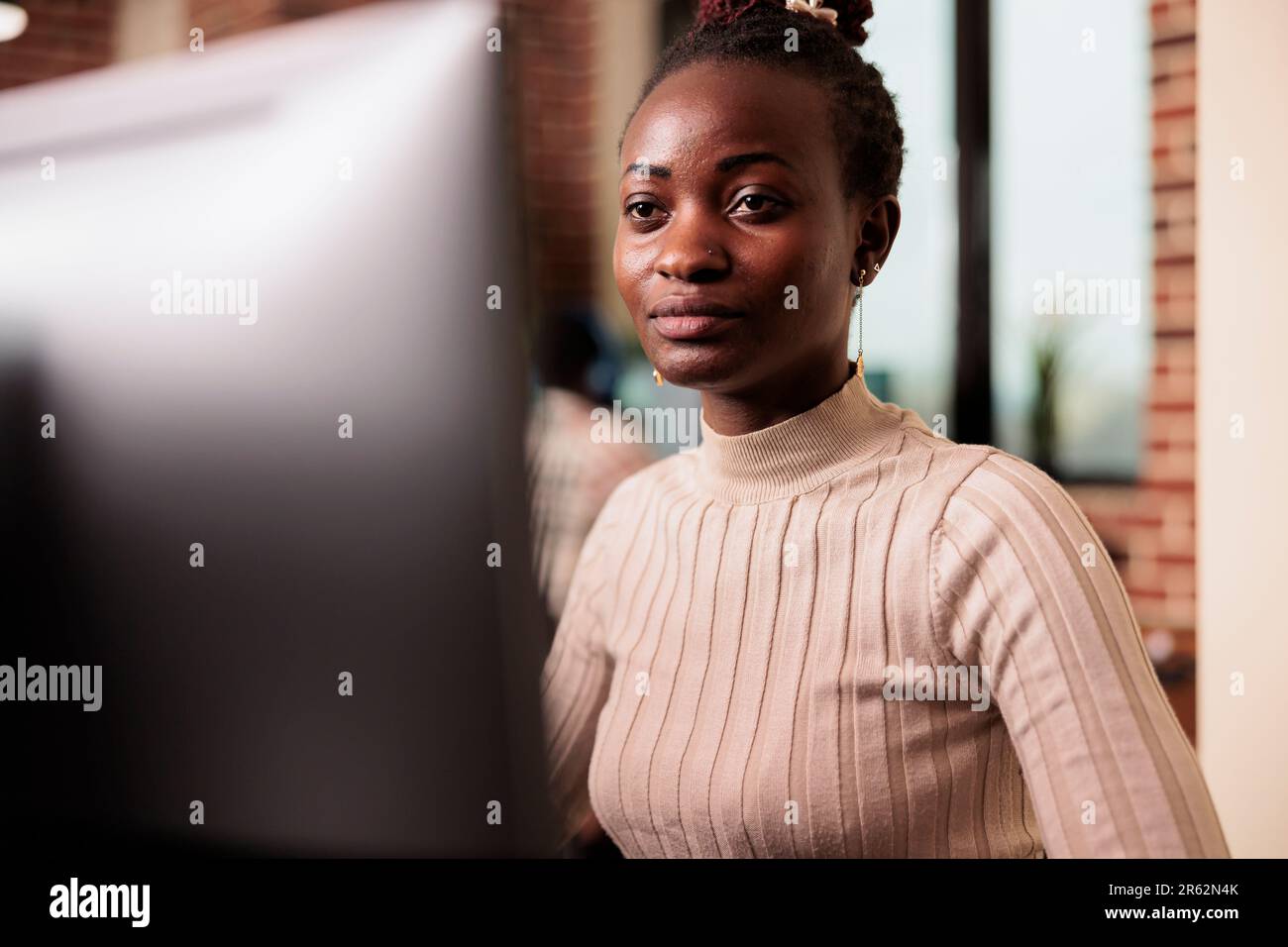 African american programmer brainstorming ideas to write code and ...