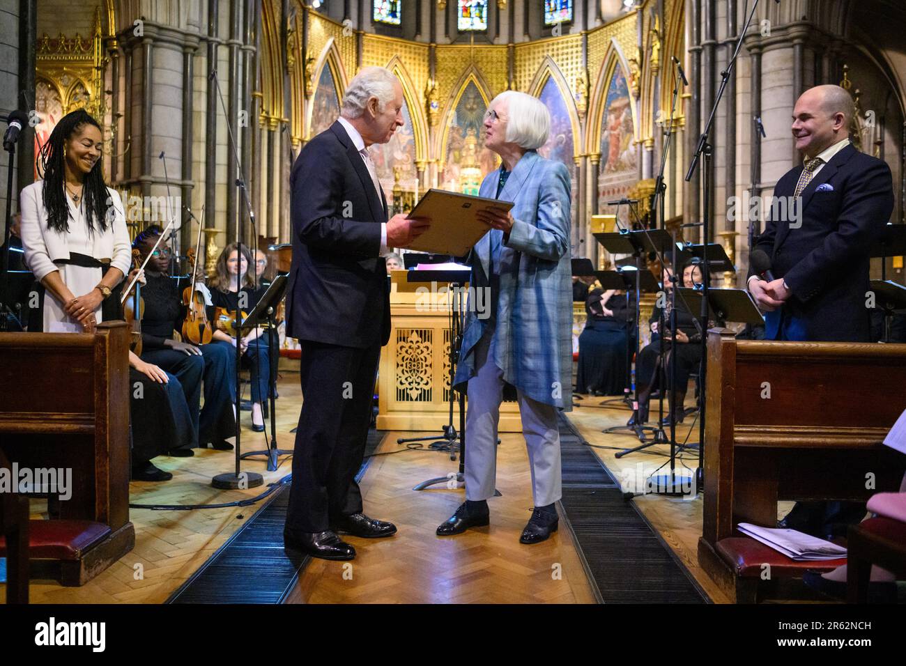 EDITORIAL USE ONLY King Charles III, with Dr Kadiatu Kanneh-Mason (left ...