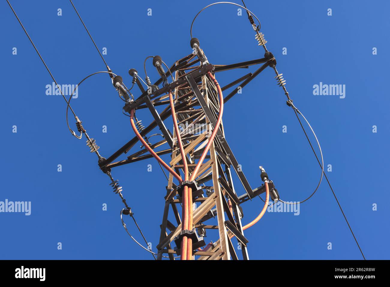 Transmission tower with deep blue sky background Stock Photo - Alamy