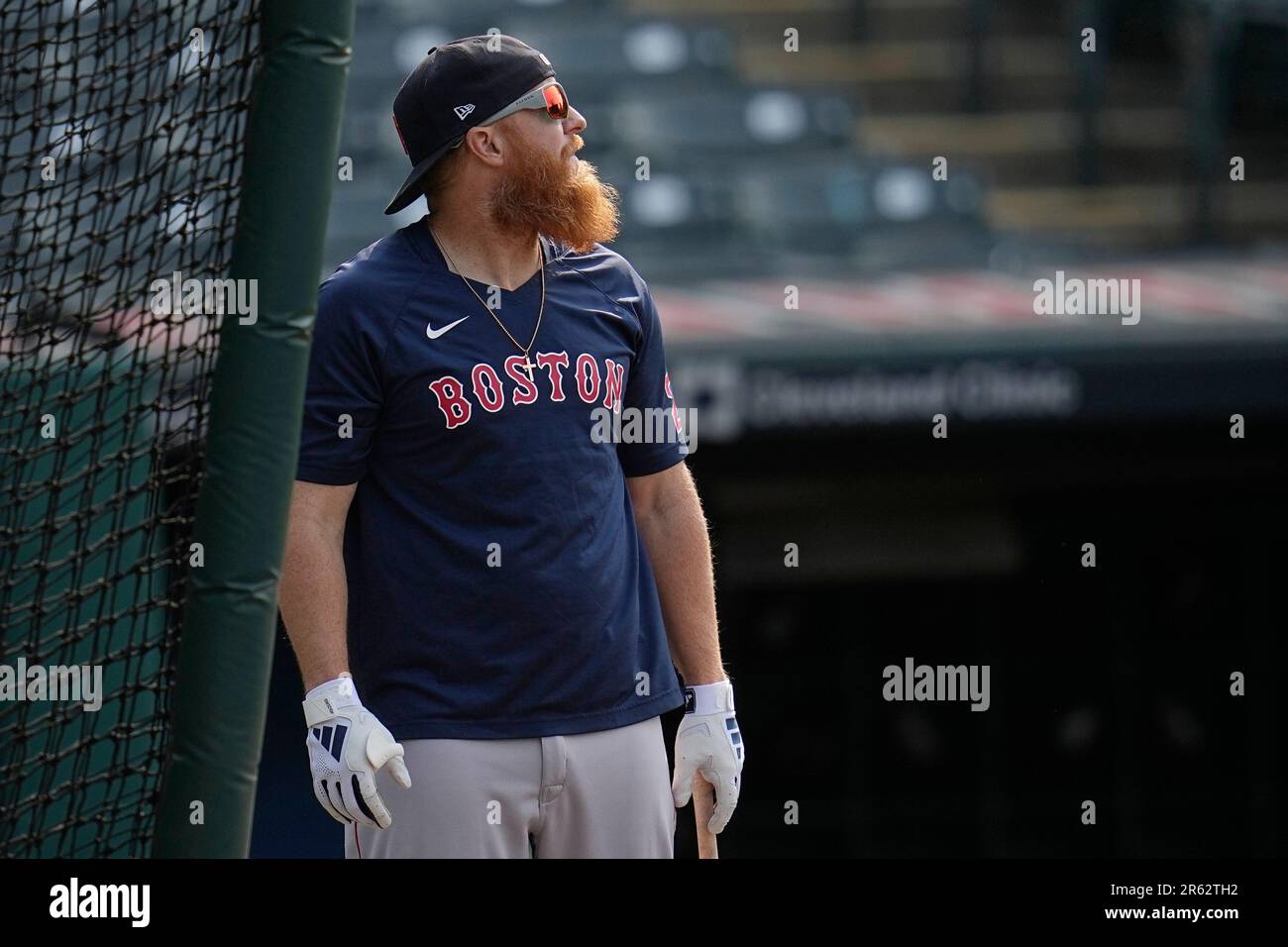 Boston Red Sox's Justin Turner watches a long fly ball during batting ...