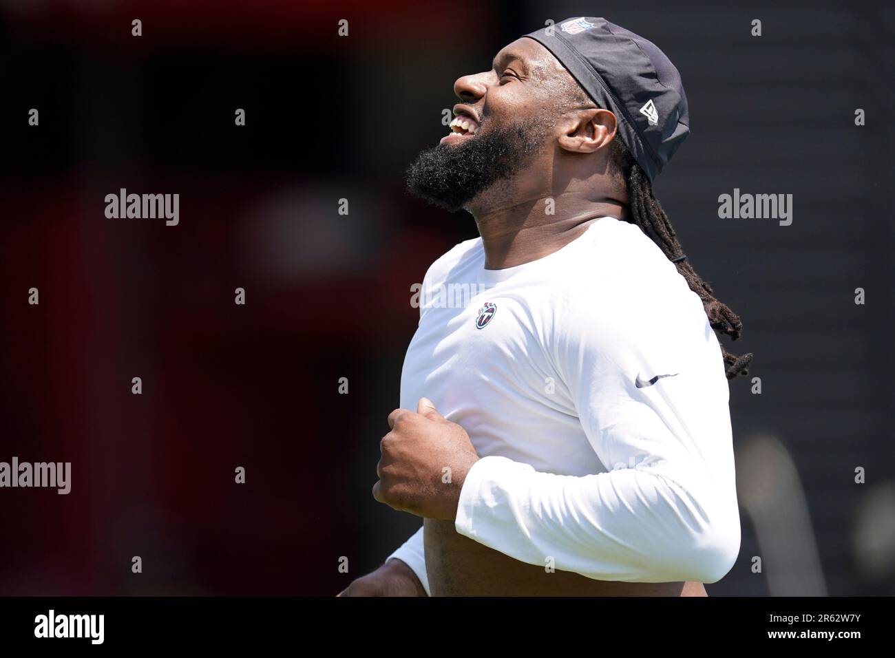 Tennessee Titans defensive lineman Denico Autry runs across the field ...