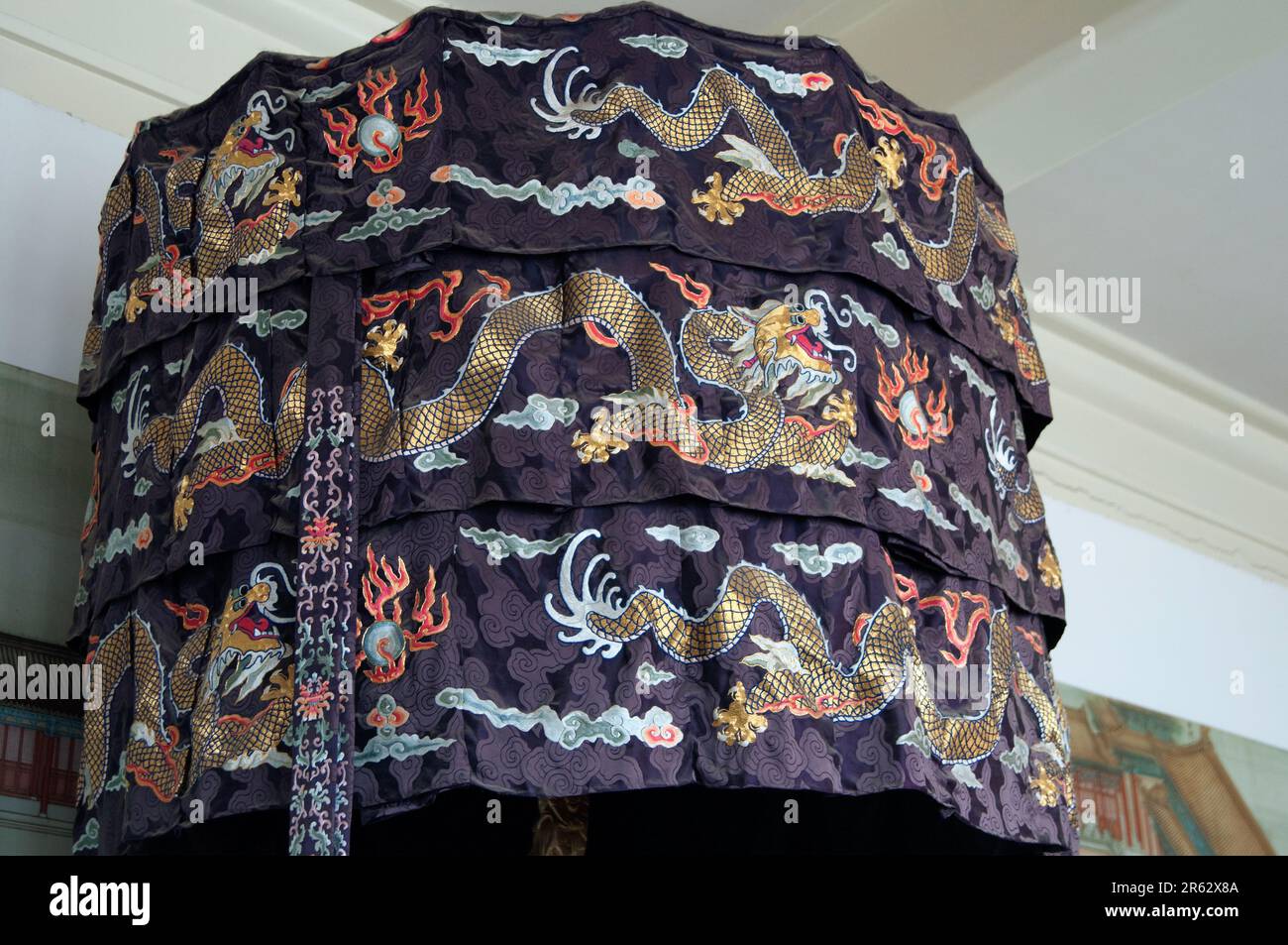 Chinese textile with orange dragons with blue background. Beijing Stock ...