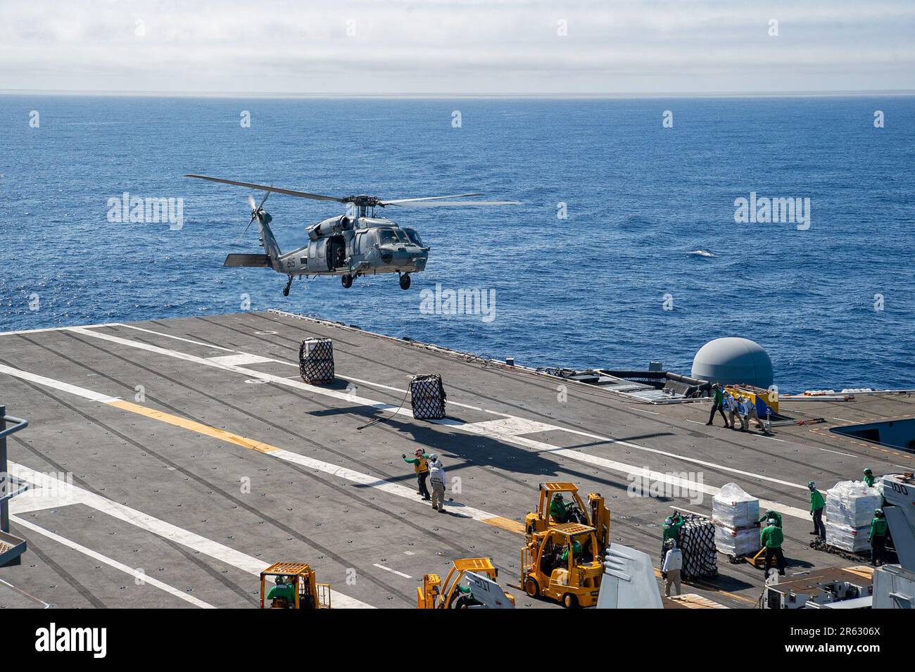 230606-N-OE145-1167 (June 6, 2023) An MH-60S Seahawk, attached to the ...