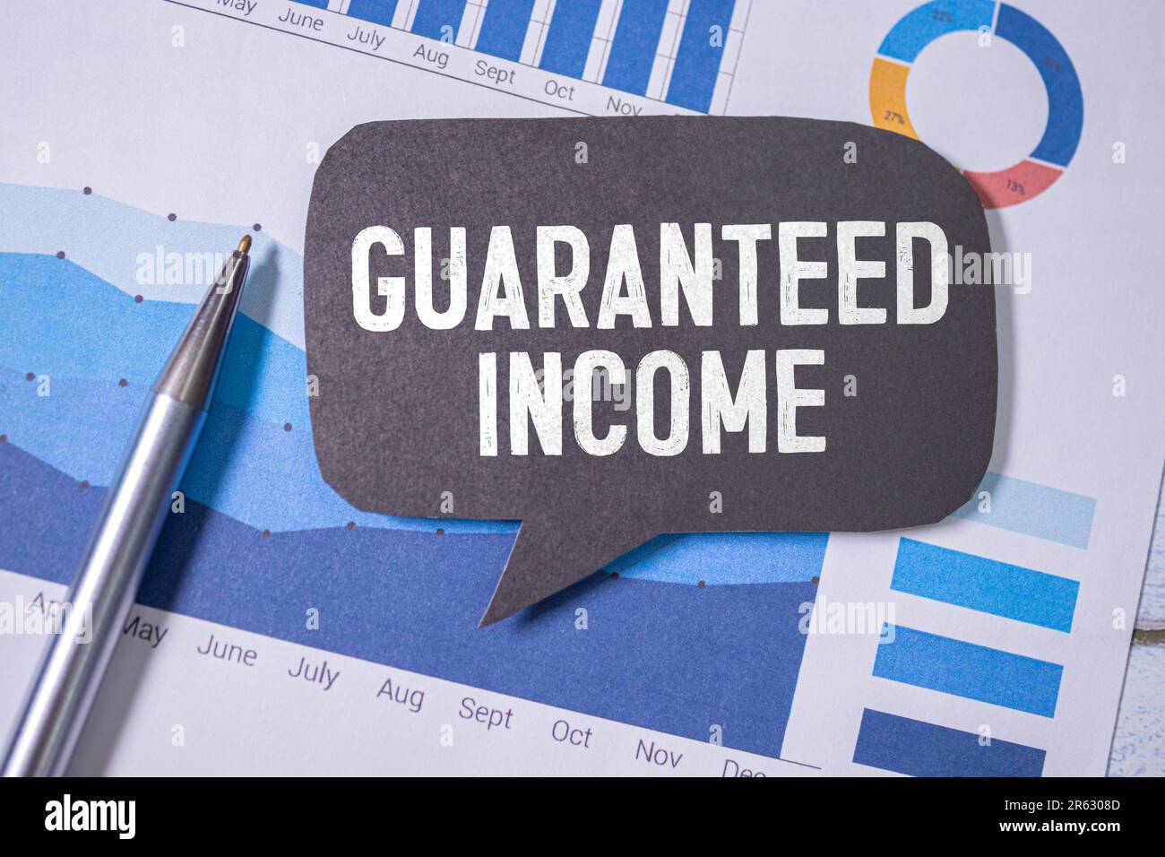 Business and Economics. On a red background, a magnifying glass and a ...