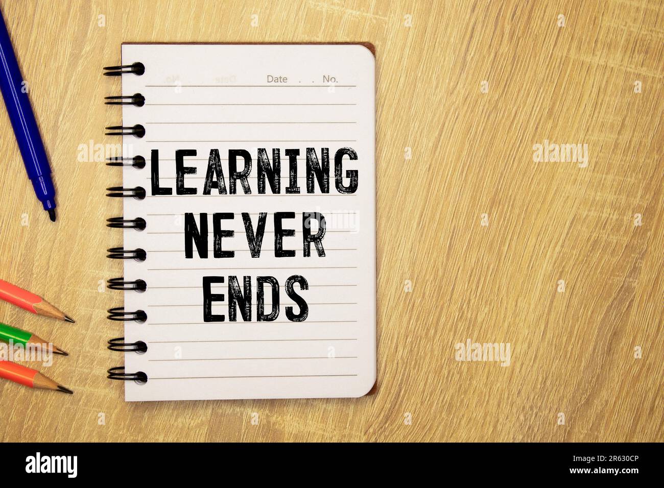 Learning Never Ends, text words typography written on paper ...