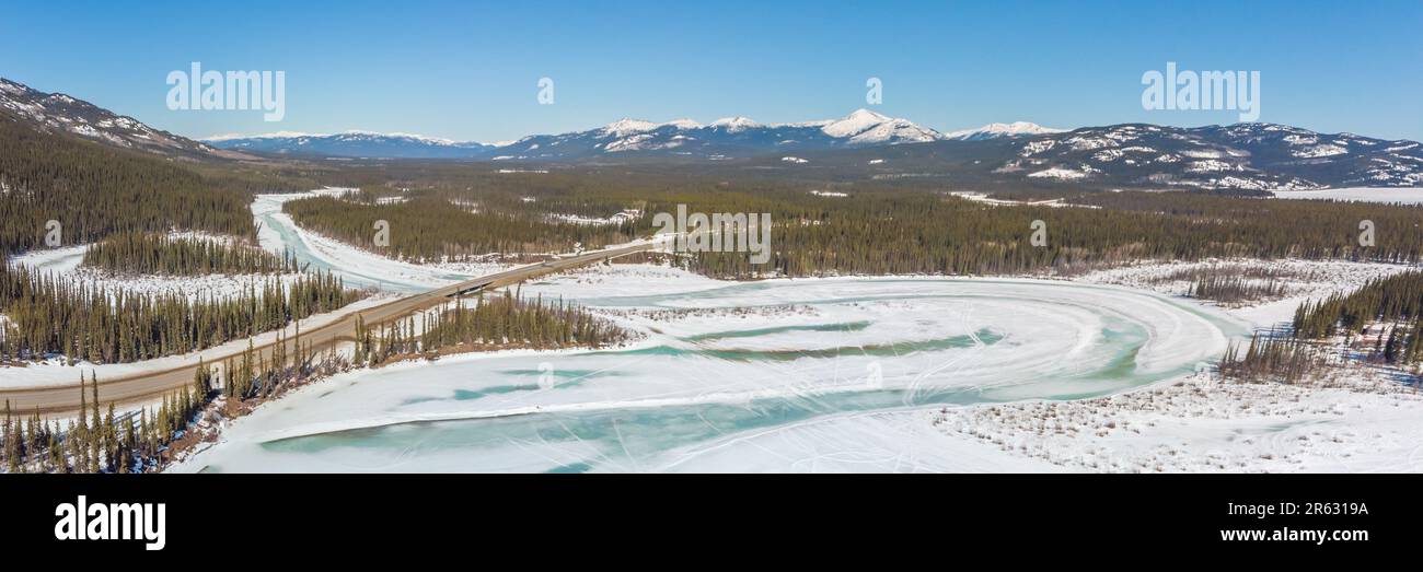 Aerial, drone view along the Alaska Highway during spring time with ...