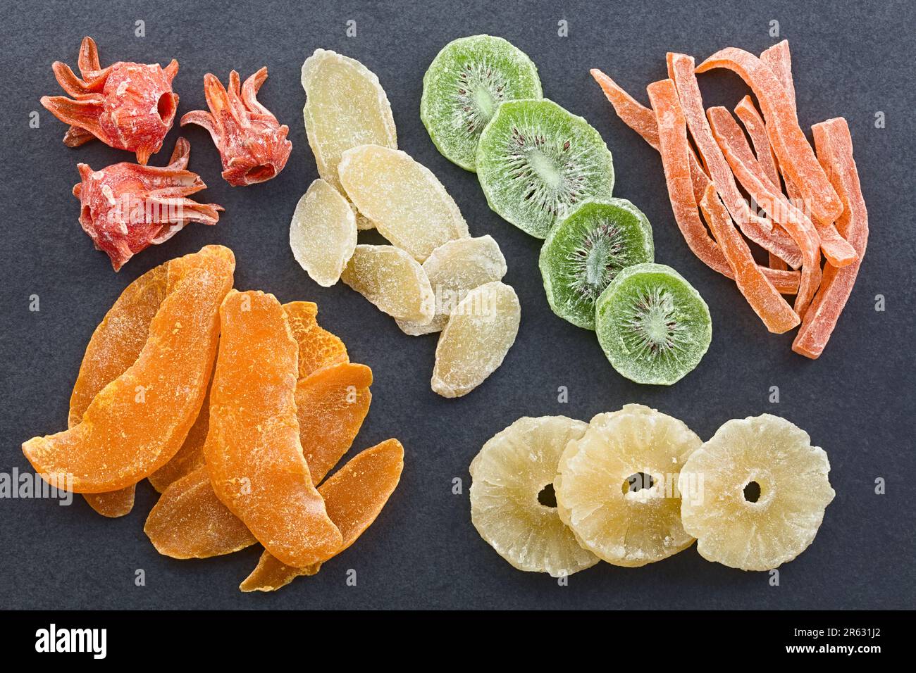 Colorful variety of crystallized candied fruits and plants (hibiscus ...