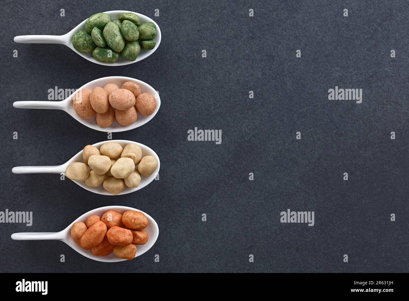 Variety of Japanese-style crunchy coated peanuts or cracker nuts with ...