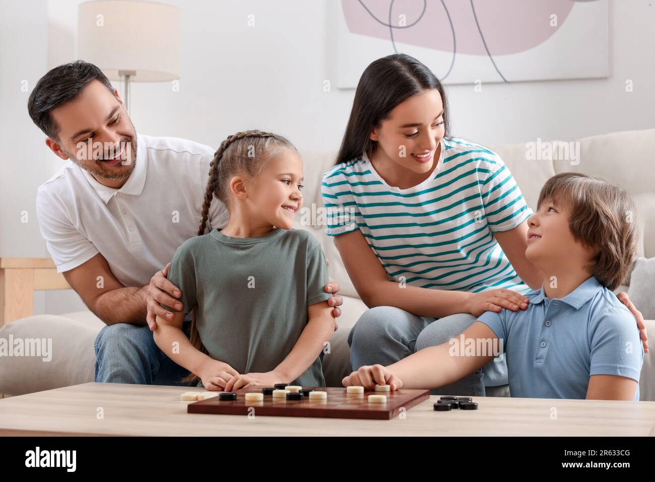 Mother father children school sport hi-res stock photography and images ...