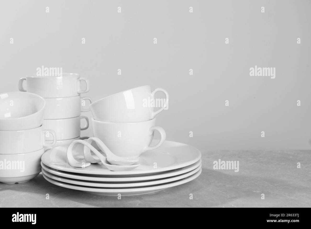 Clean cups on table Black and White Stock Photos & Images - Alamy