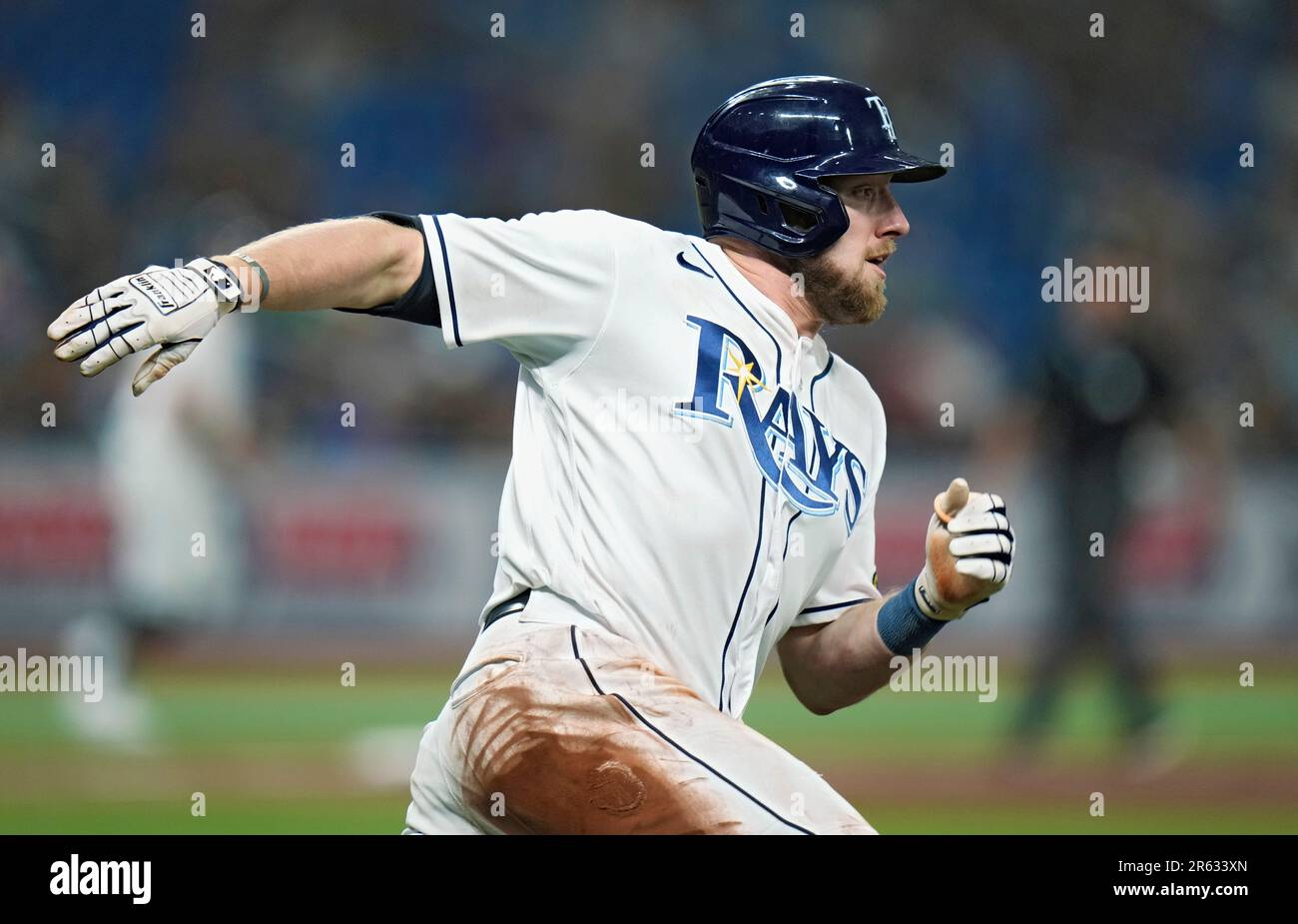 Tampa Bay Rays' Luke Raley runs the bases after hitting a triple off ...