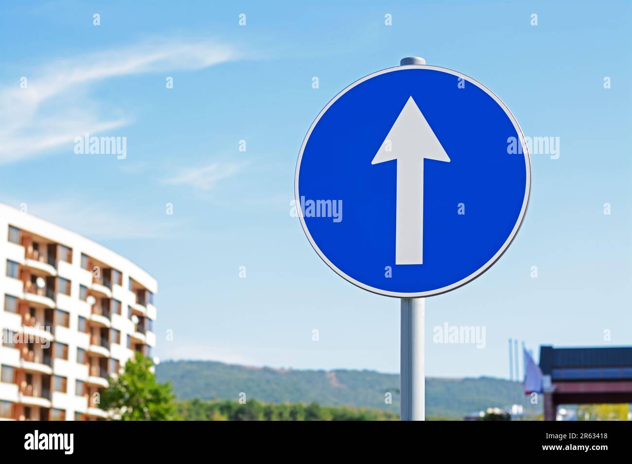 Post with traffic sign Proceed Straight Ahead Only outdoors on sunny ...