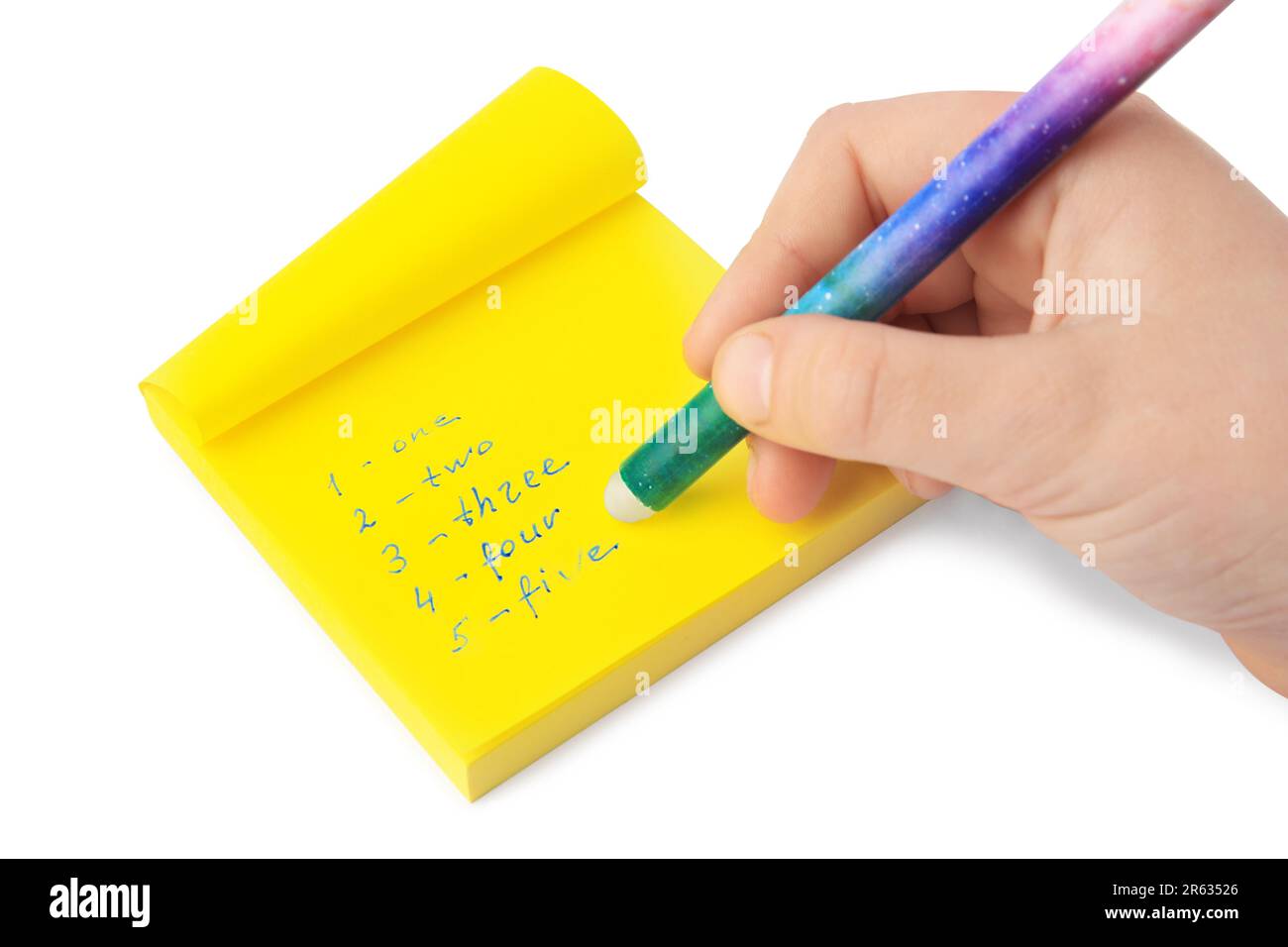Child erasing word Five written with erasable pen on sticky note ...