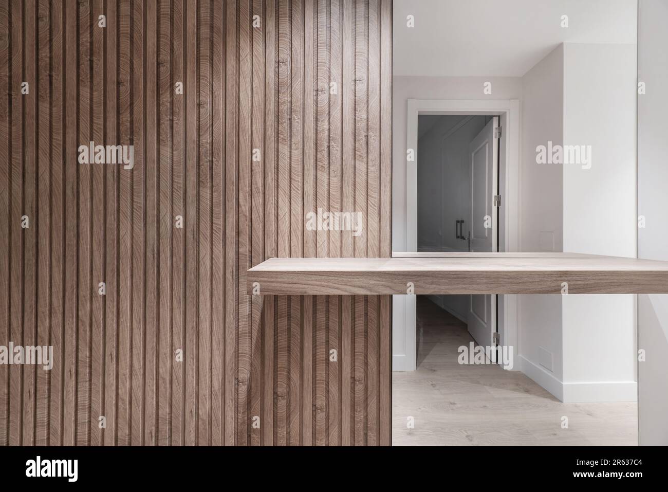 Nice hall of a house with a wooden sideboard, a mural of the same color ...