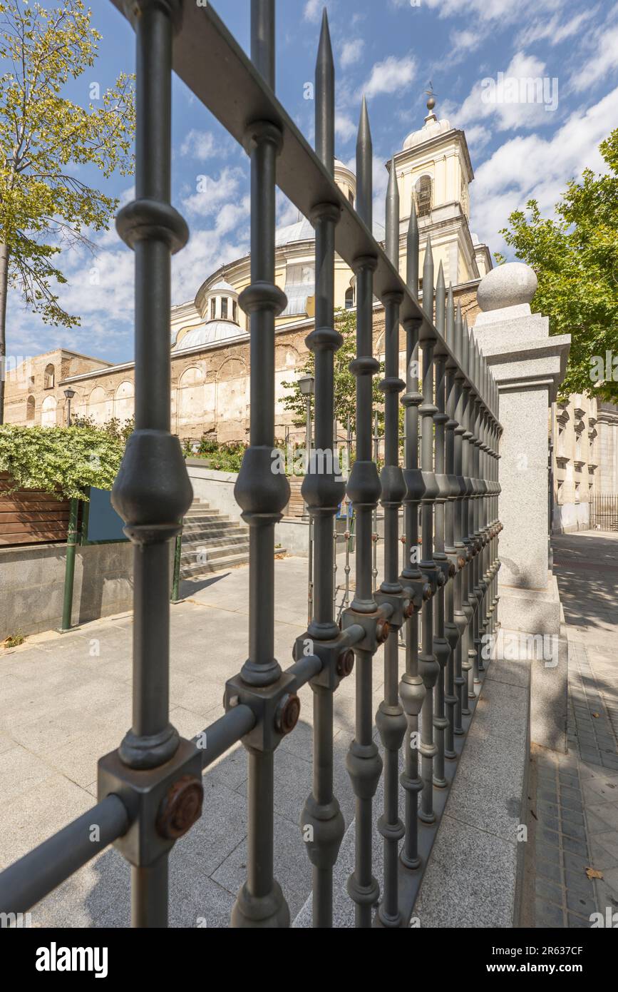 A black painted wrought iron fence outside a large church Stock Photo ...