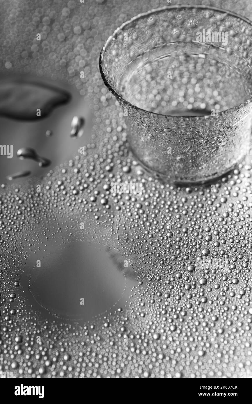 A glass surface with a multitude of water spray drops Stock Photo - Alamy