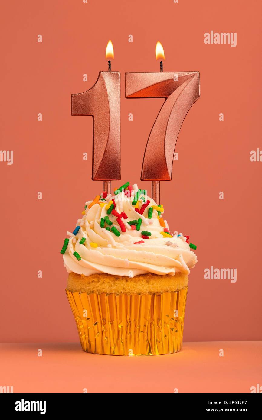Birthday cake with candle number 17 - Coral fusion background Stock ...