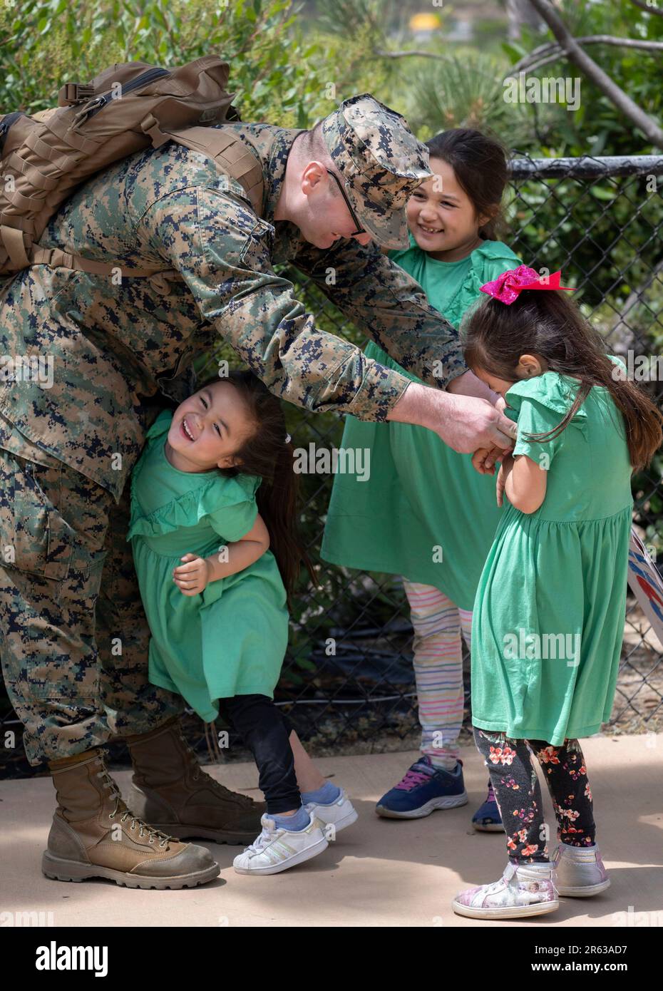 Gunnery Sgt. Matthew Burcham is greeted by his three daughters from ...