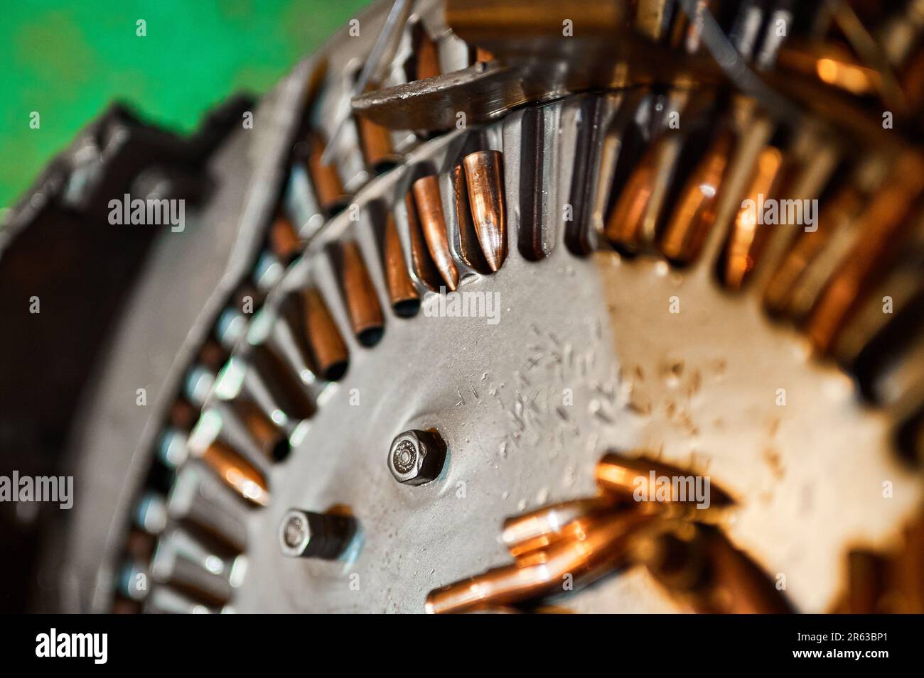 Pile of Copper bullet shells and turning wheel at production line Stock ...