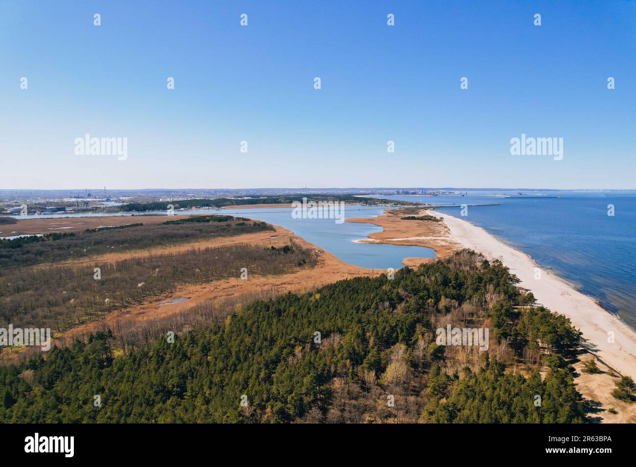Aerial view drone of river goes into the sea. Delta of Vistula river ...